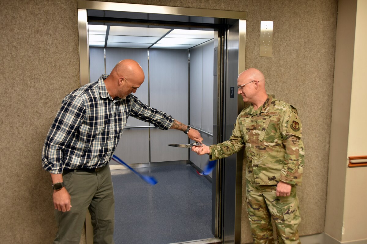 AEDC team members mark elevator replacement with ribbon cutting ...
