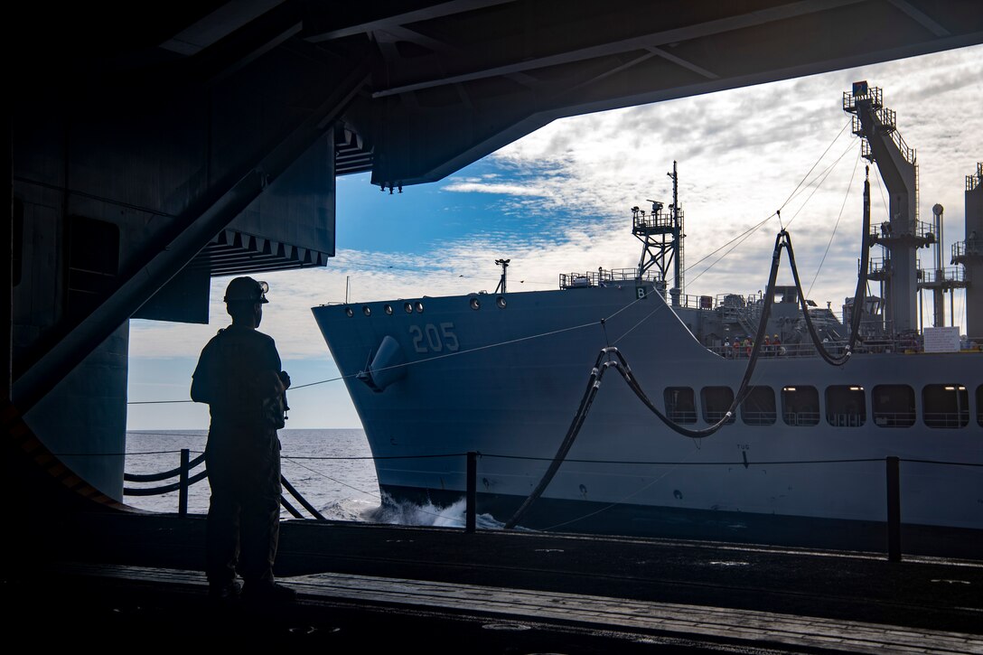 USS Nimitz conducts replenishment-at-sea with USNS John Lewis in South ...