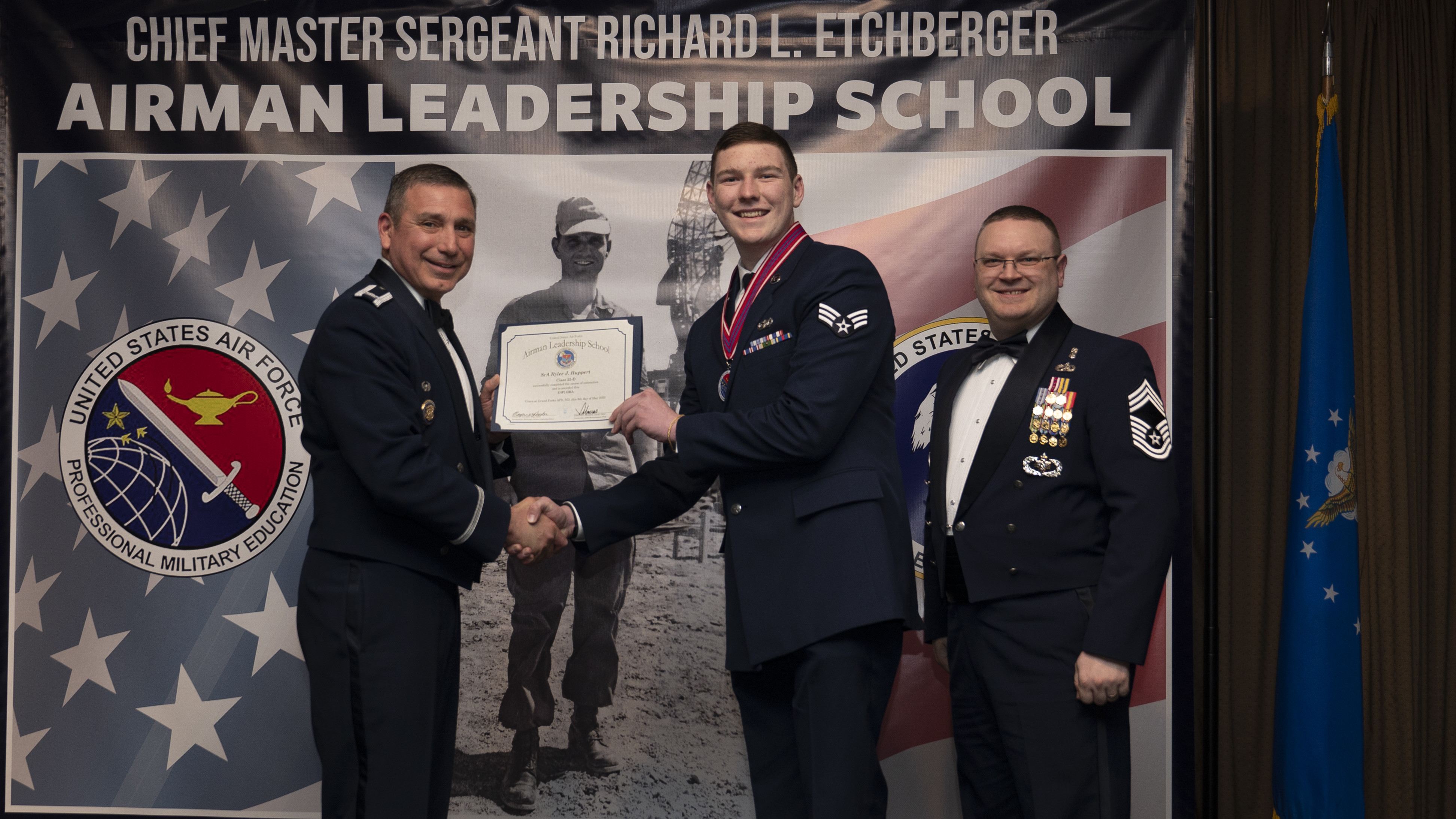 ALS class 25-D students celebrate graduation at Grand Forks AFB