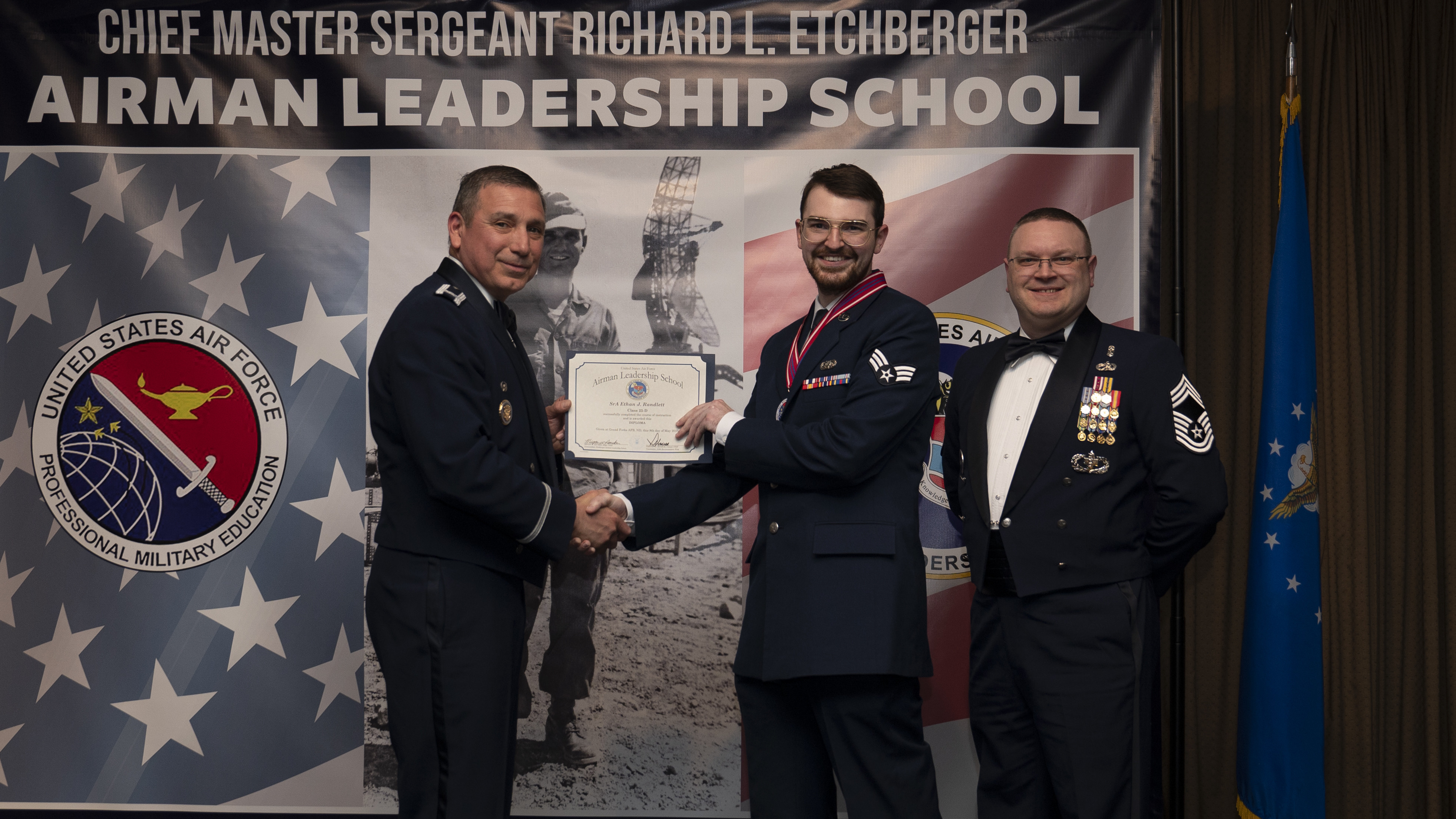 ALS class 25-D students celebrate graduation at Grand Forks AFB