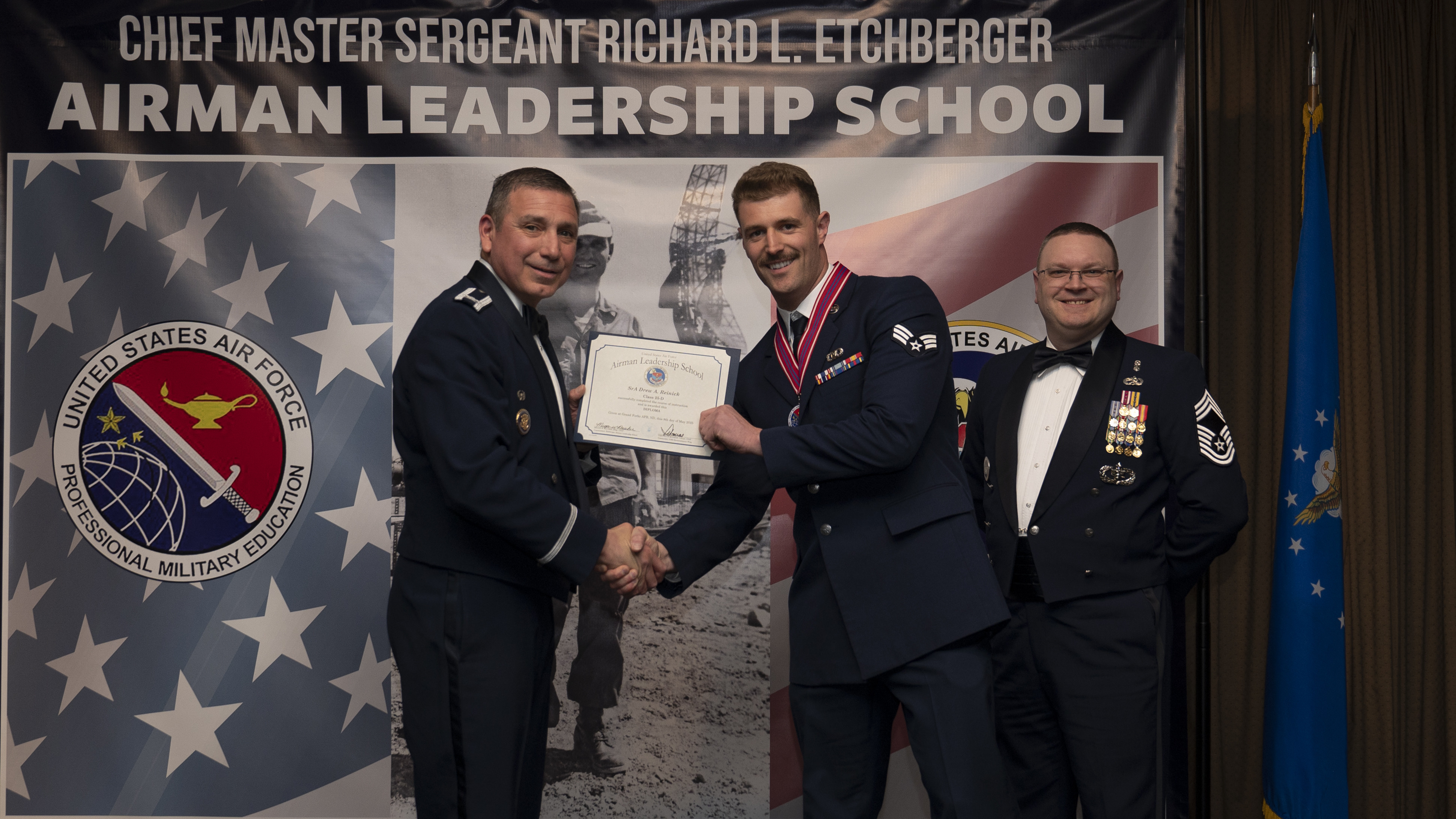 ALS class 25-D students celebrate graduation at Grand Forks AFB