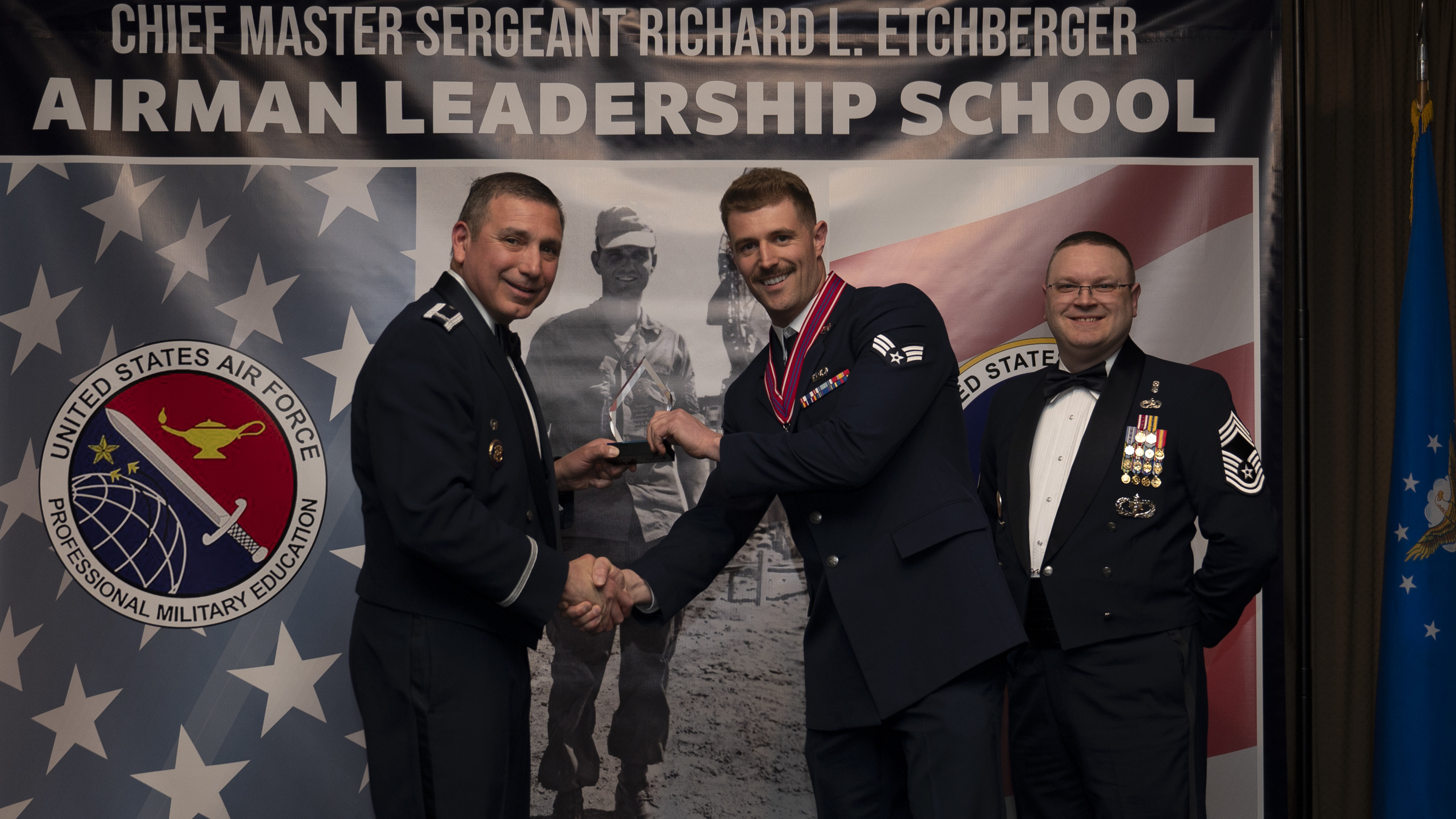 ALS class 25-D students celebrate graduation at Grand Forks AFB