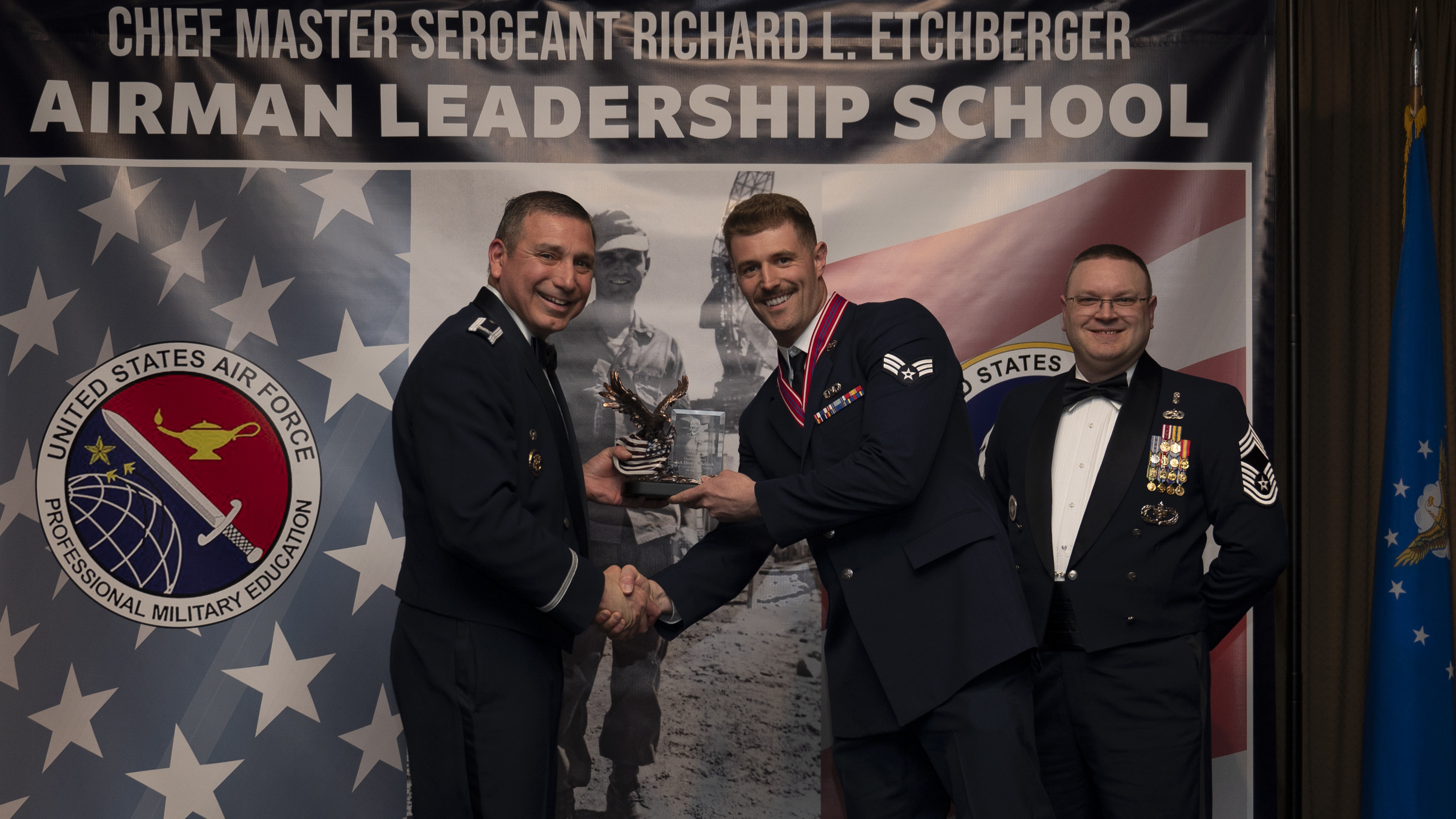 ALS class 25-D students celebrate graduation at Grand Forks AFB