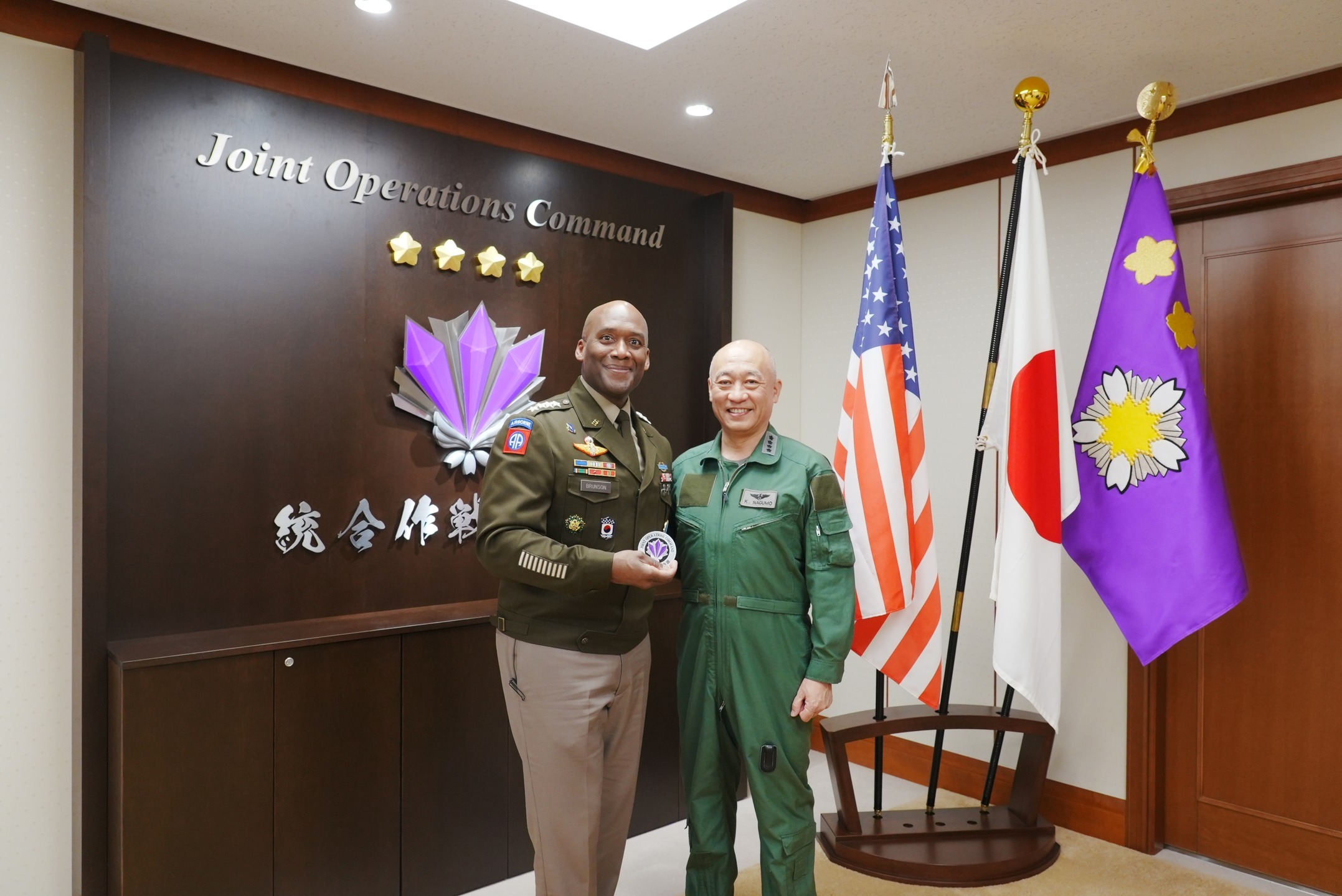 U.S. Army Gen. Xavier Brunson (left), commander of United Nations ...