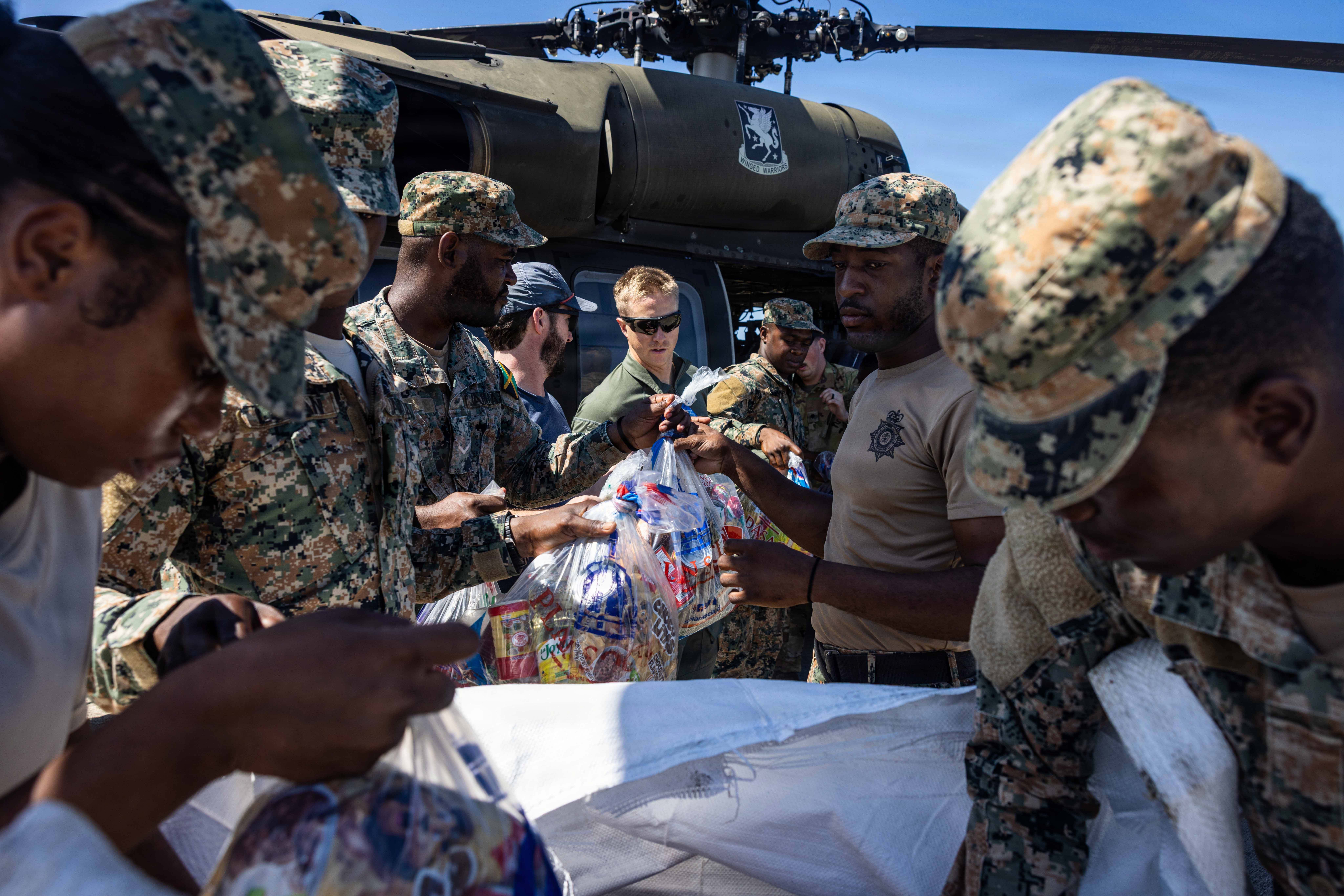 Help From Above: Service Members Airlift Relief to Hurricane-Hit ...
