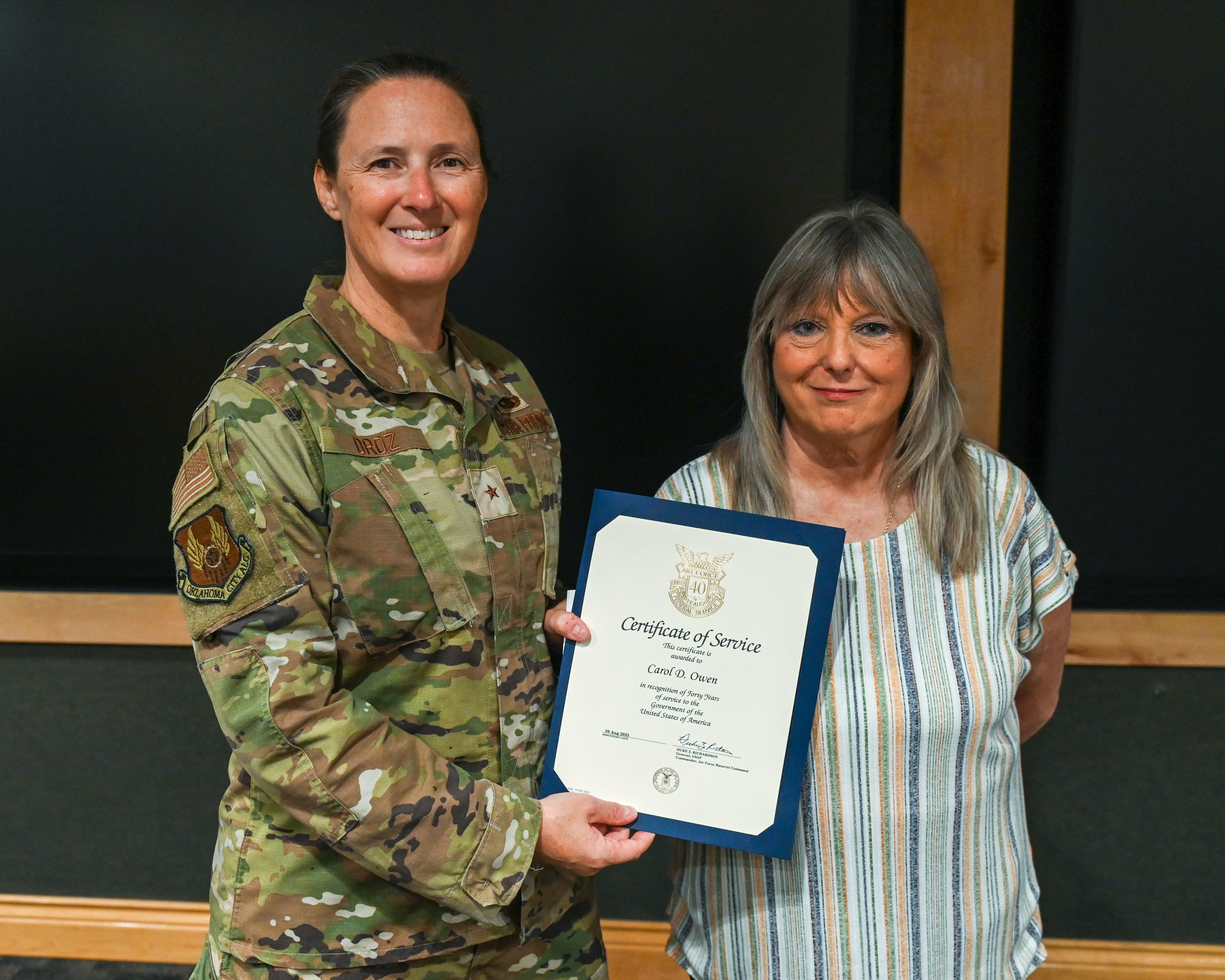 Eight combined decades of dedication: Two OC-ALC employees reach ...