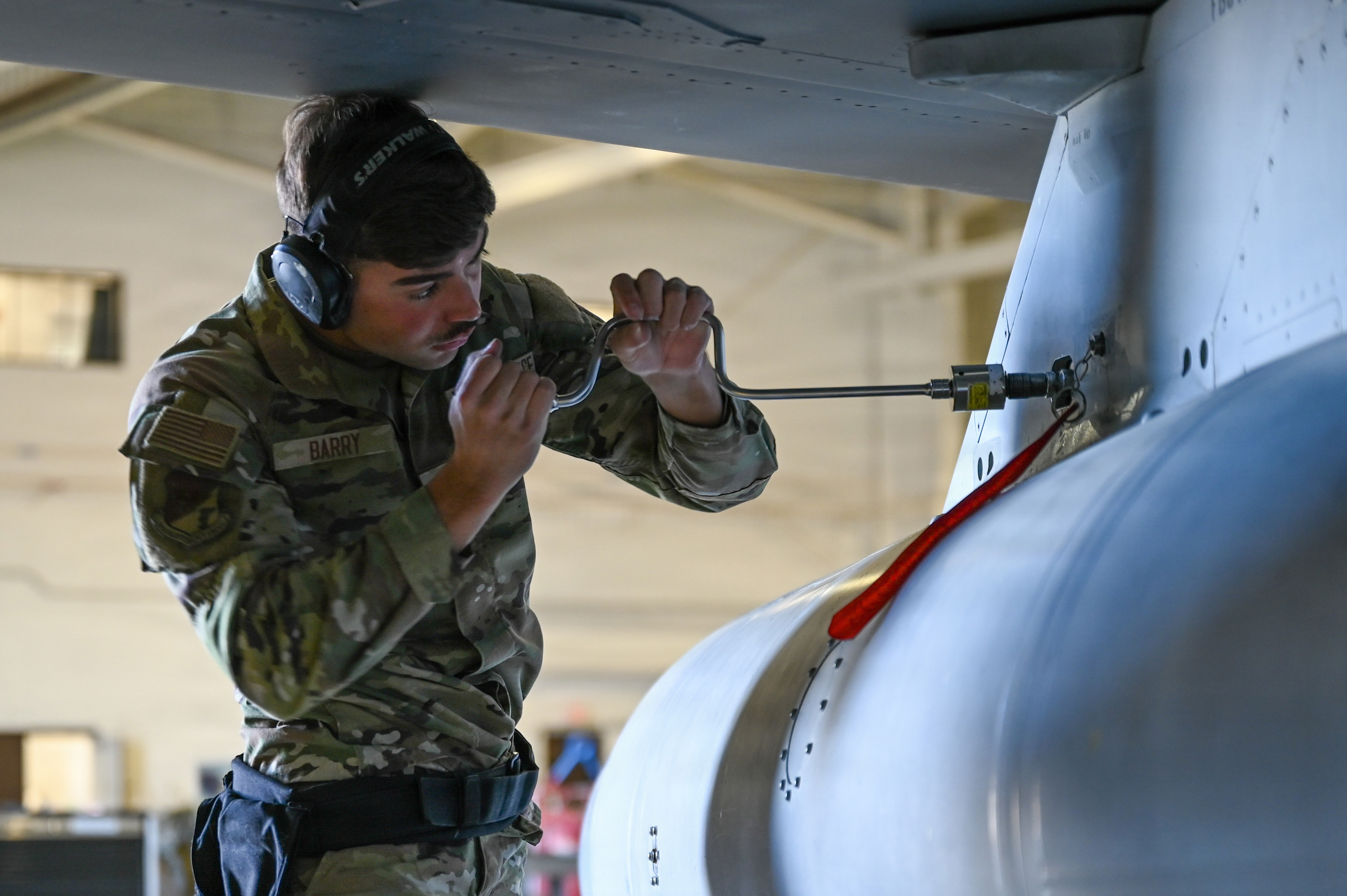 849th Aircraft Maintenance Squadron Airmen load weapons onto F-16 ...